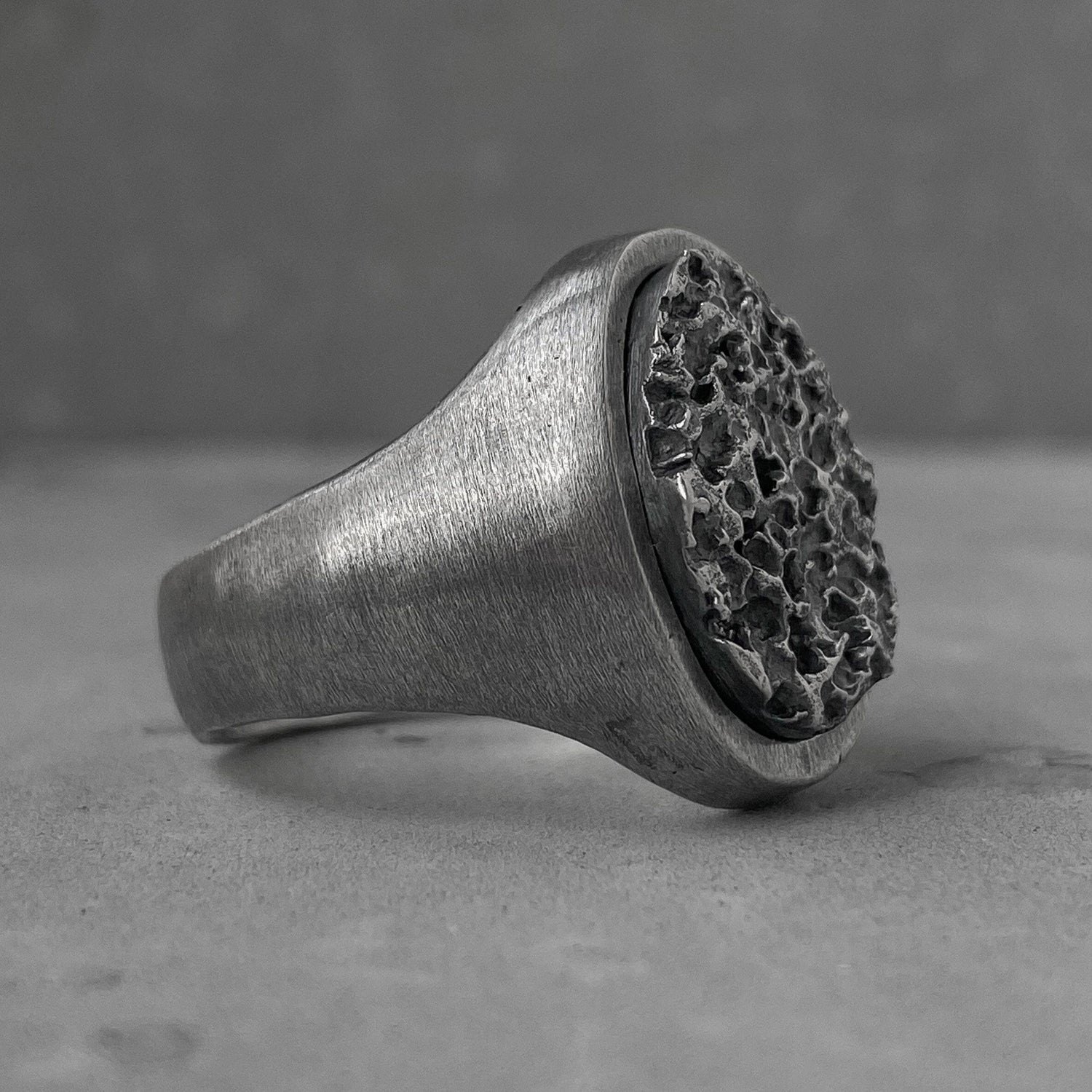 Project50g | Acid ring- Oval signet ring with molten metal texture on ...