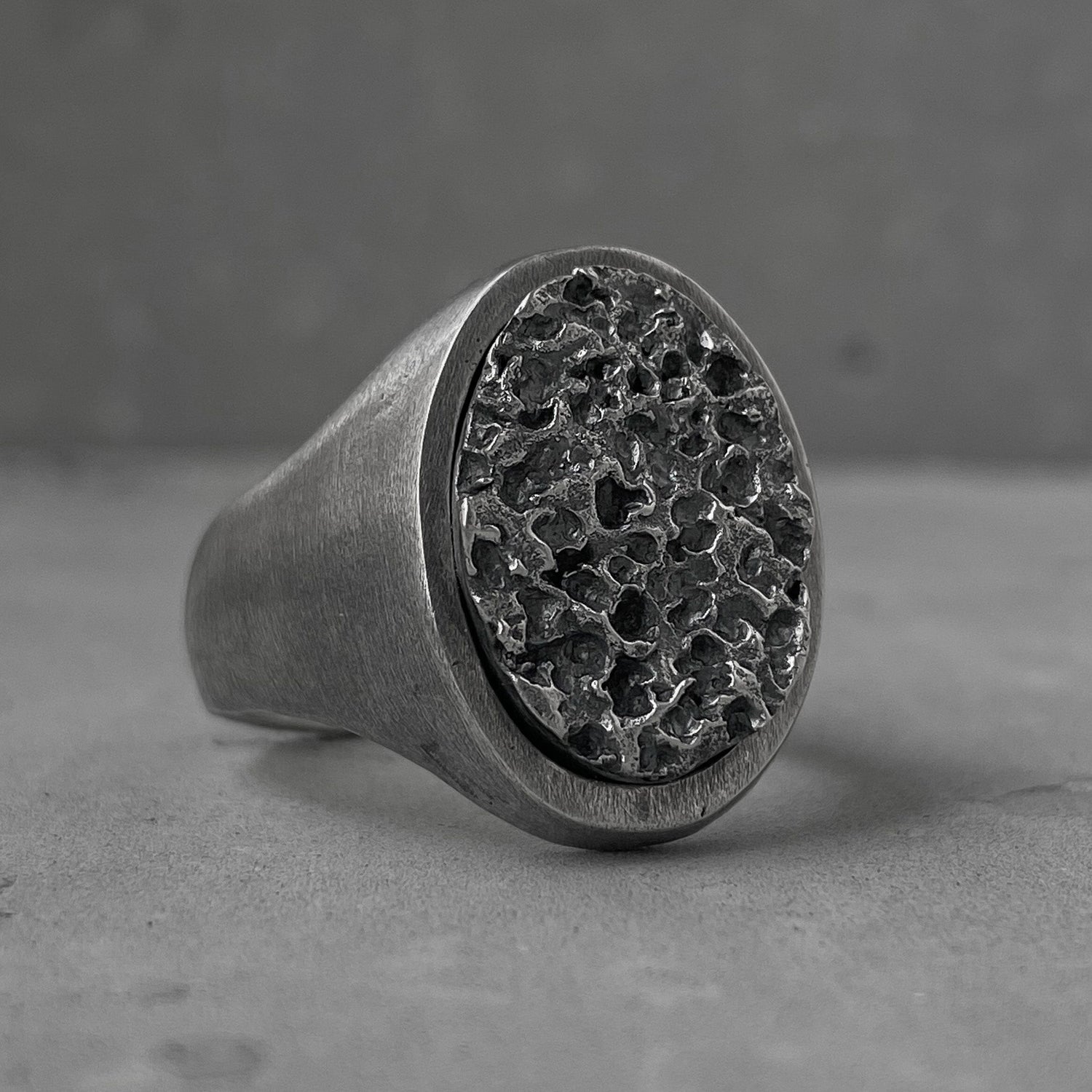 Project50g | Acid ring- Oval signet ring with molten metal texture on ...