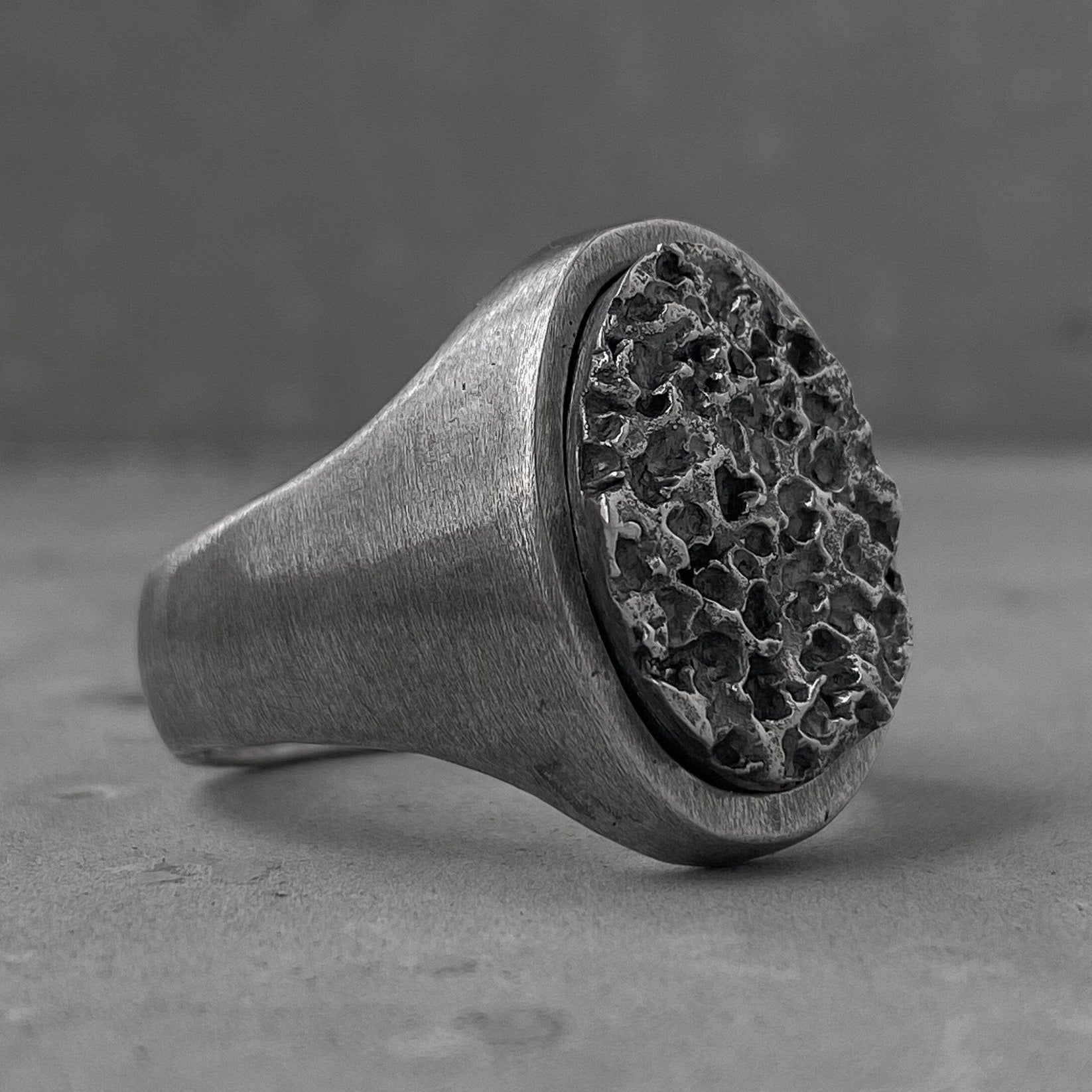 Project50g | Acid ring- Oval signet ring with molten metal texture on ...