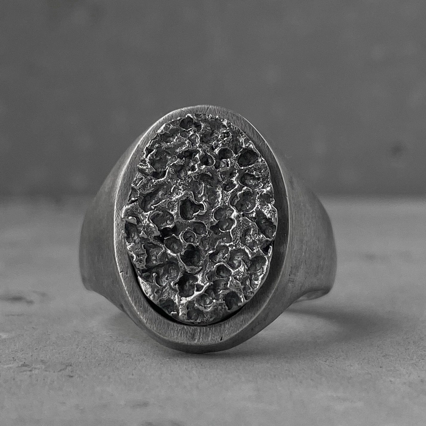 Project50g | Acid ring- Oval signet ring with molten metal texture on ...