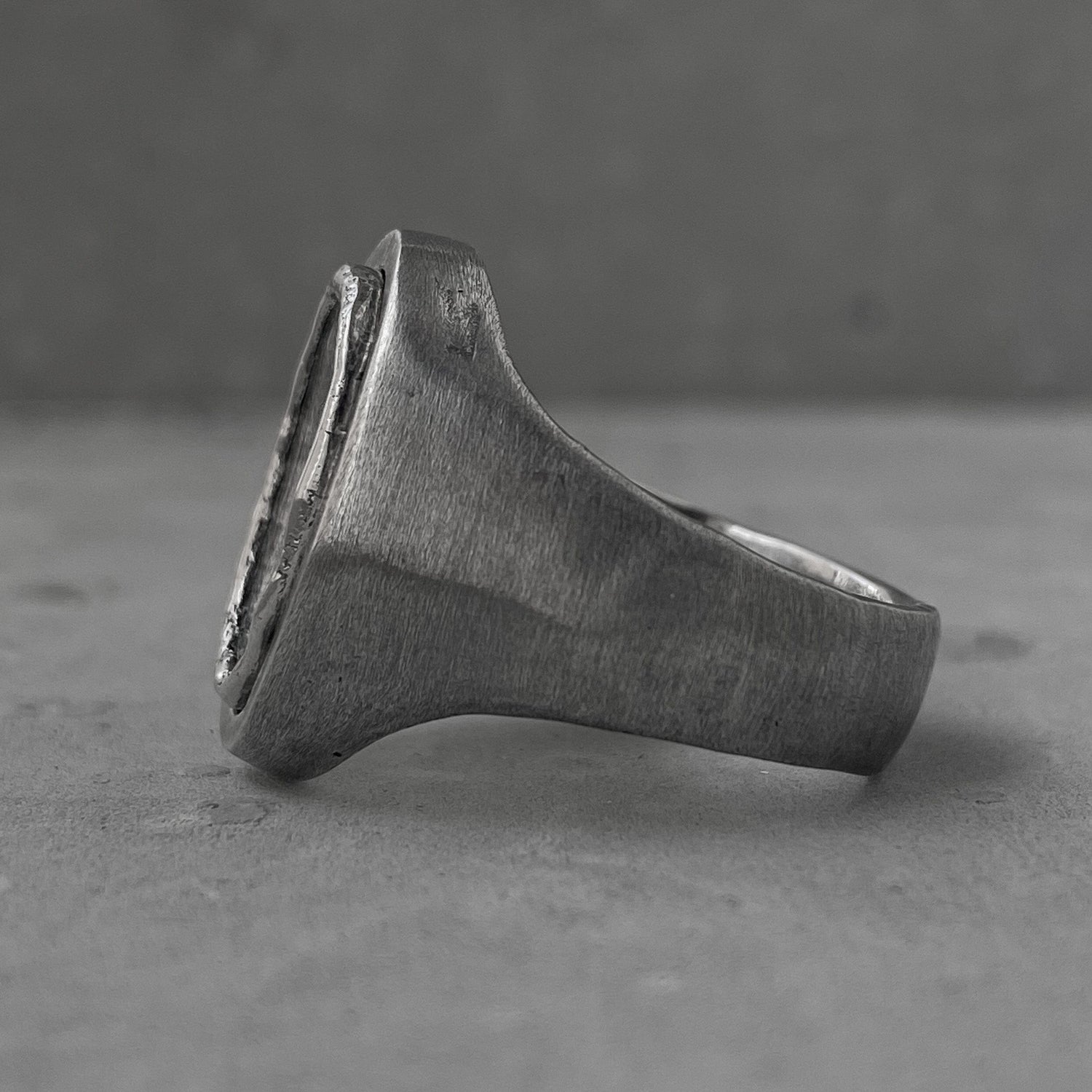 Project50g | Acid ring- Oval signet ring with molten metal texture on ...