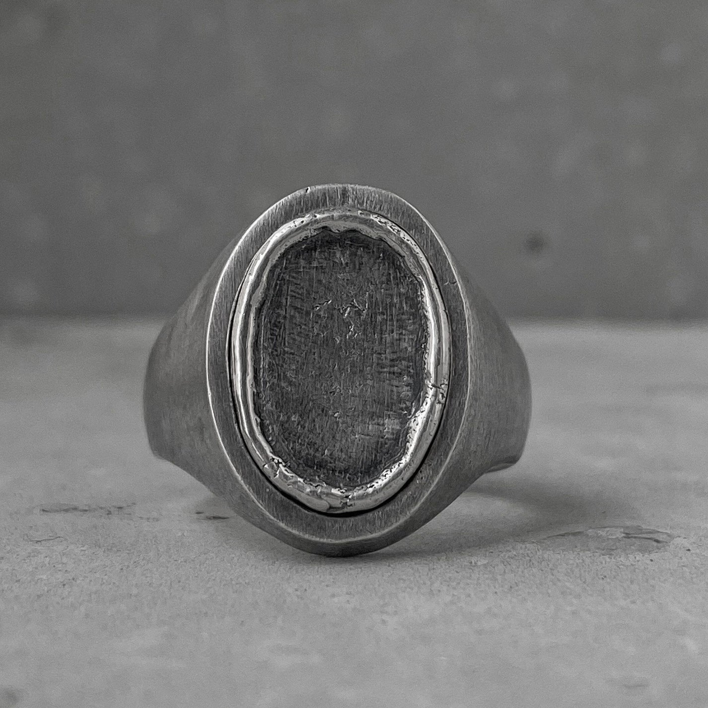 Project50g | Acid ring- Oval signet ring with molten metal texture on ...