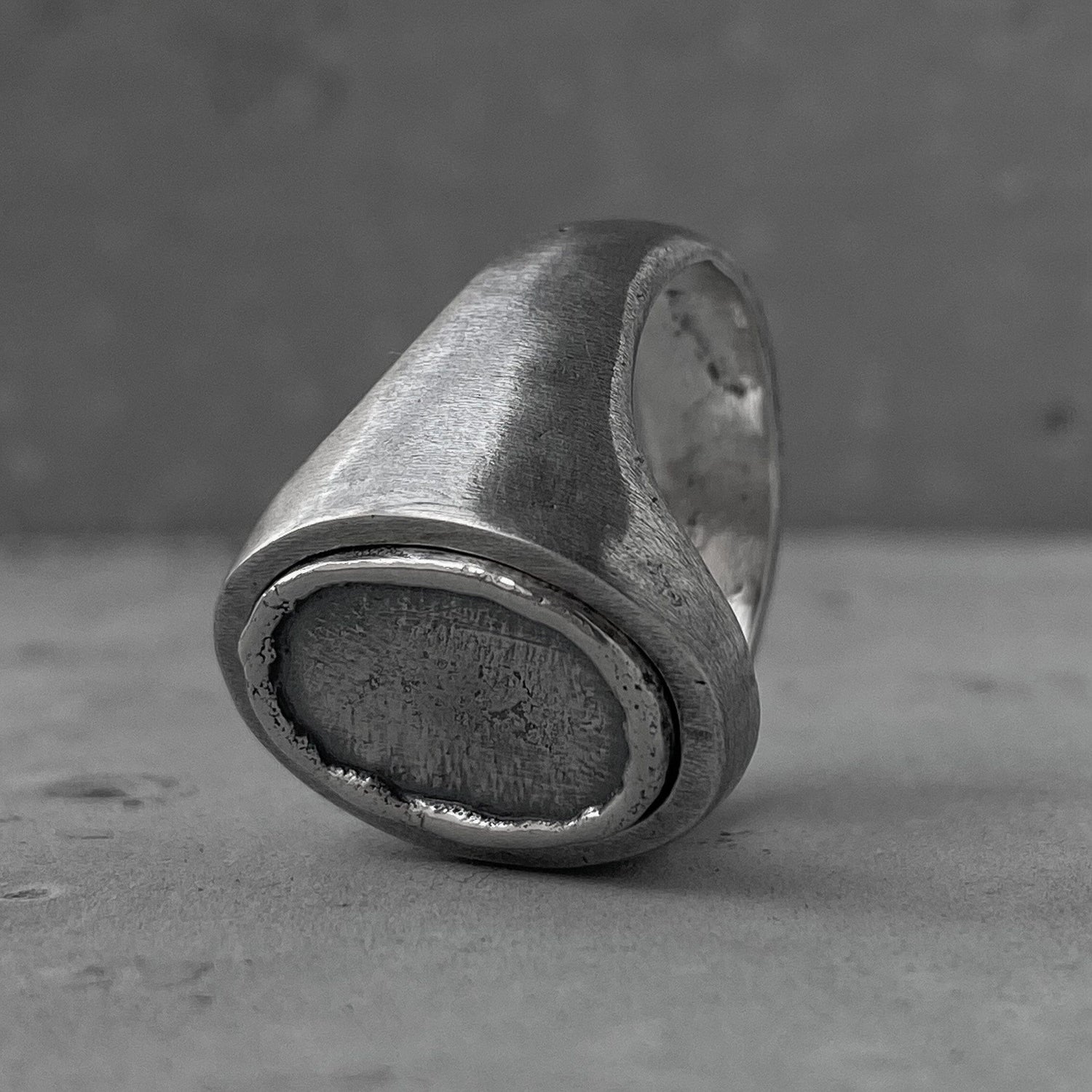 Project50g | Acid ring- Oval signet ring with molten metal texture on ...